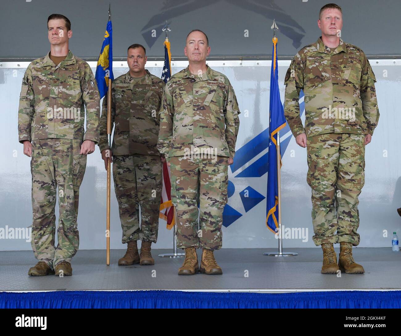 U.S. Air Force Col. Jason A. Purdy, right, prepares to assume command ...