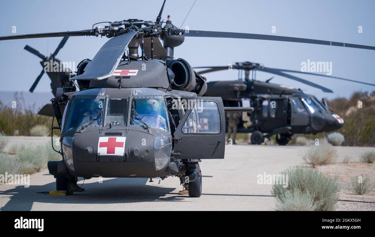 Two UH-60 Blackhawks from C Company, "Desert Dustoff," 2916th Aviation ...