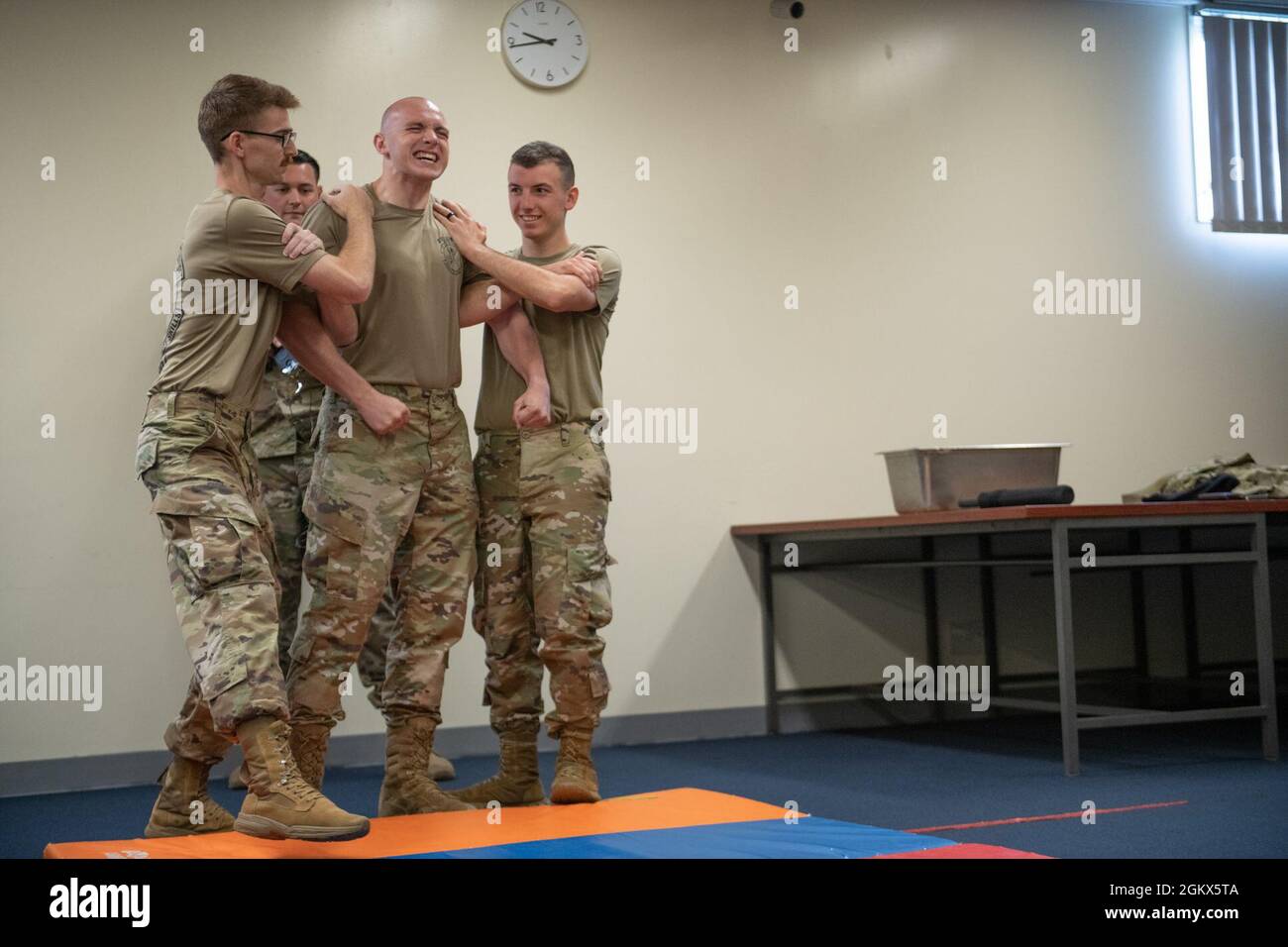 U.S. Airmen from the 18th Security Forces Squadron participate in taser ...
