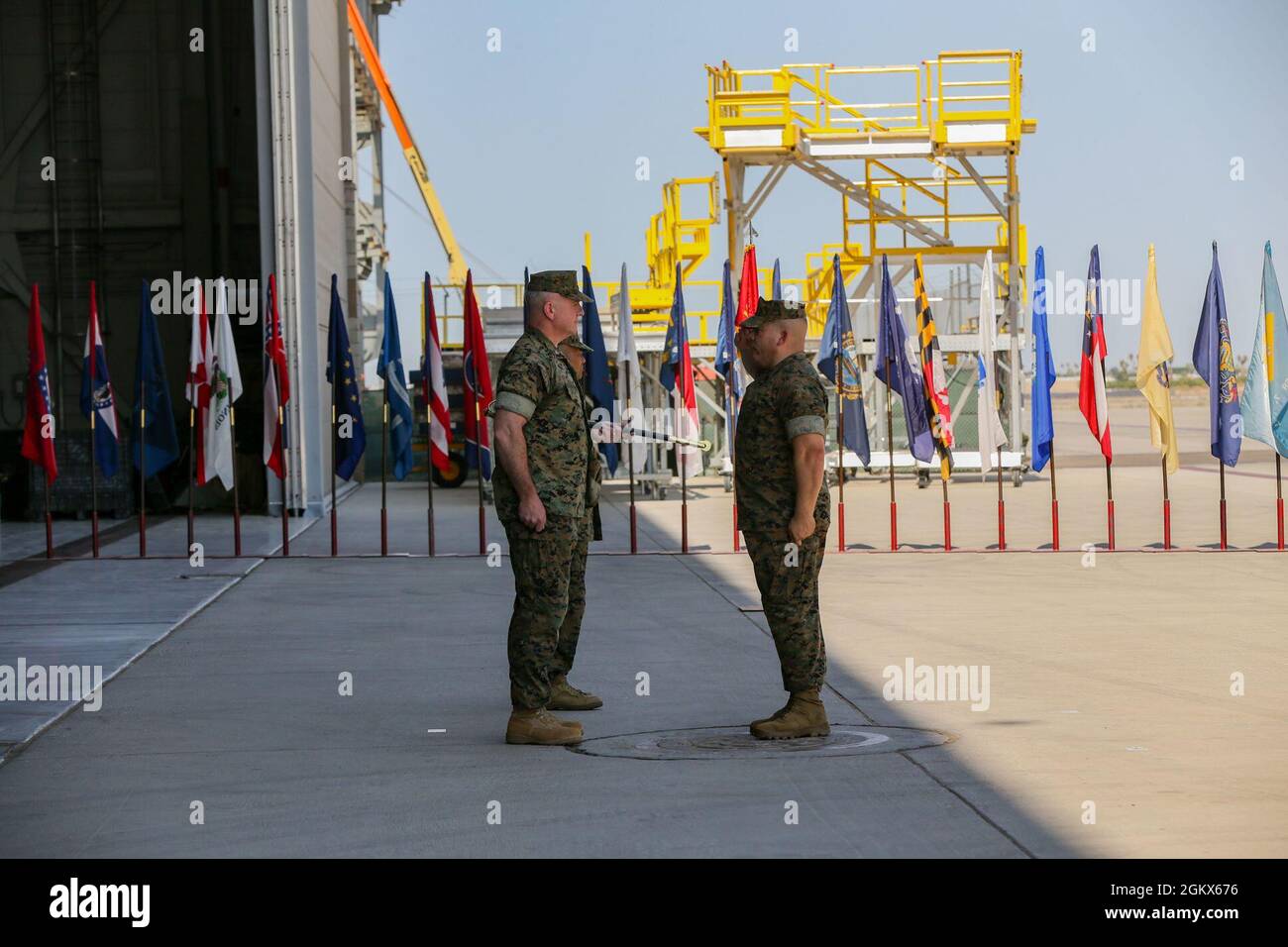 U.S. Marine Corps Sgt. Maj. Frank Gratacos salutes Col. Bryon Sullivan ...
