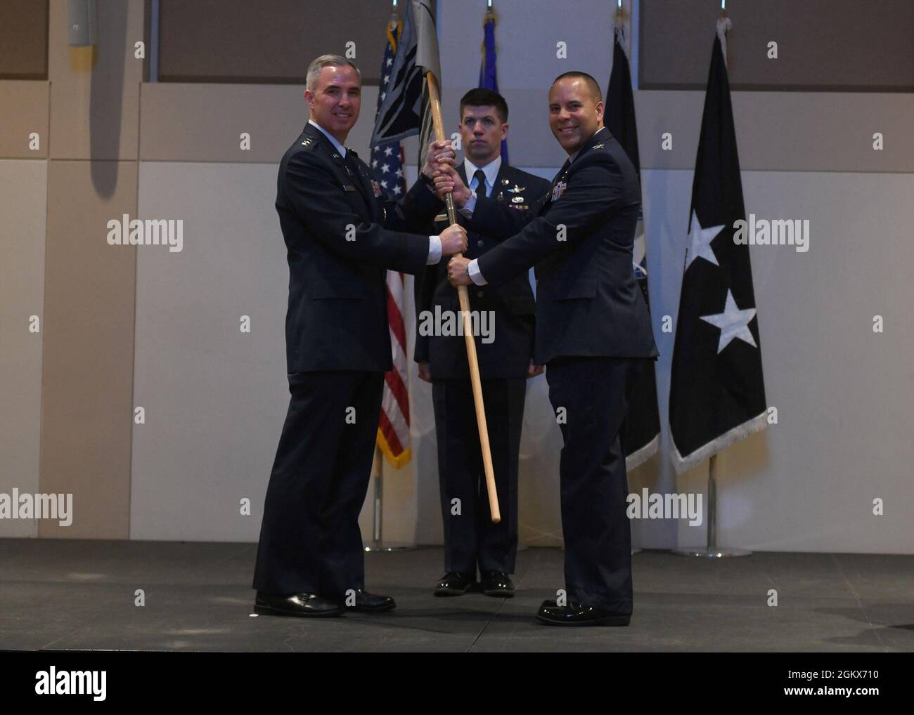 Col. Miguel Cruz, incoming Space Delta 4 commander, receives the guidon ...