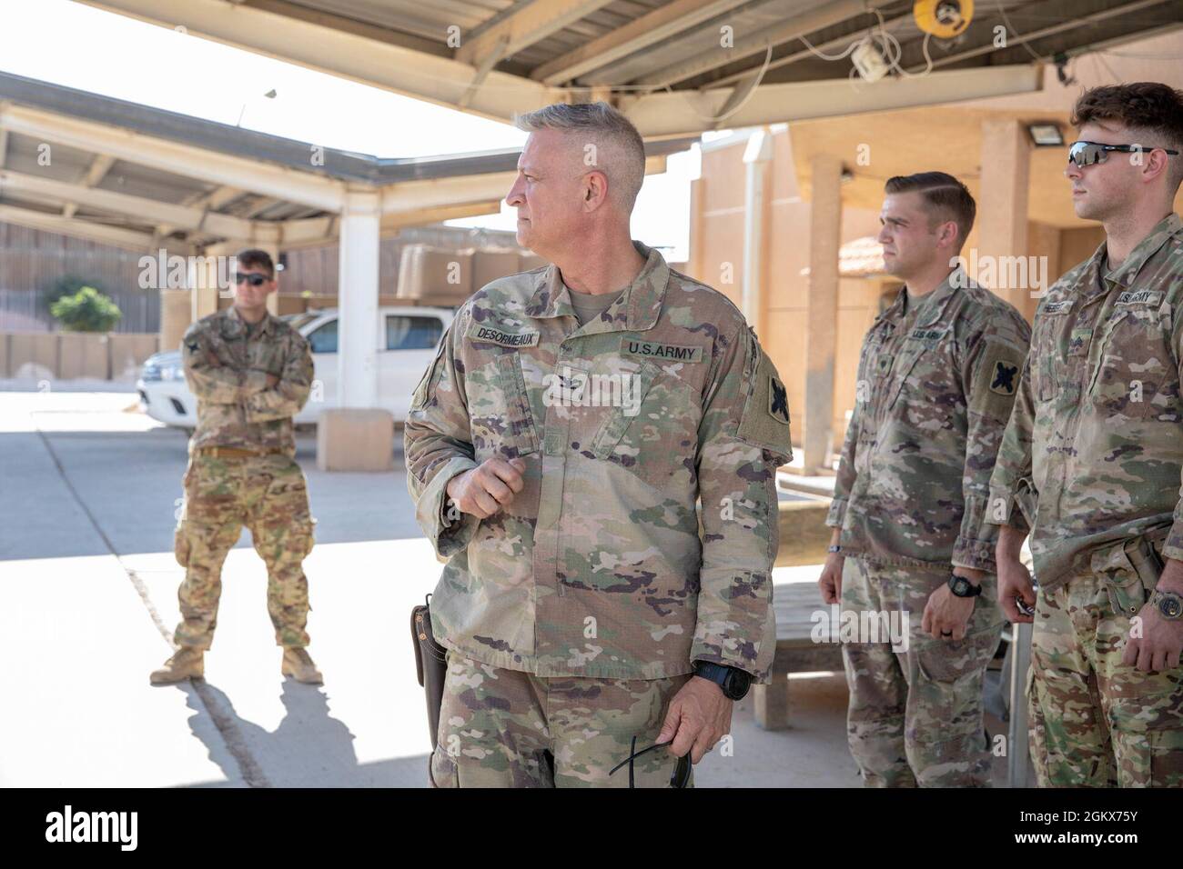 On July 15, 2021 U.S Army Coronel Scott Desormeaux presents coins to ...