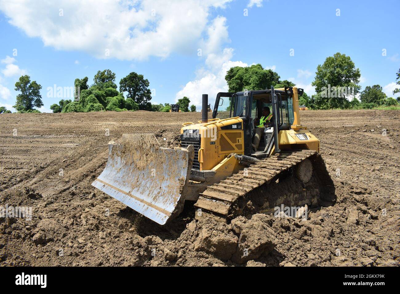 Heavy equipment operators from the U.S. Army Corps of Engineers ...