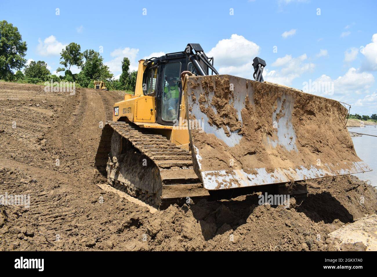 Heavy equipment operators from the U.S. Army Corps of Engineers ...