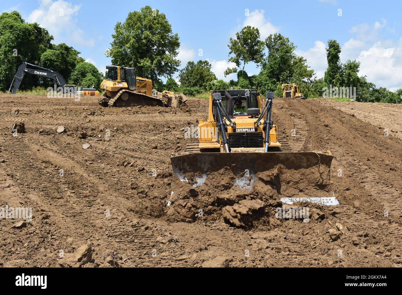 Heavy equipment operators from the U.S. Army Corps of Engineers ...