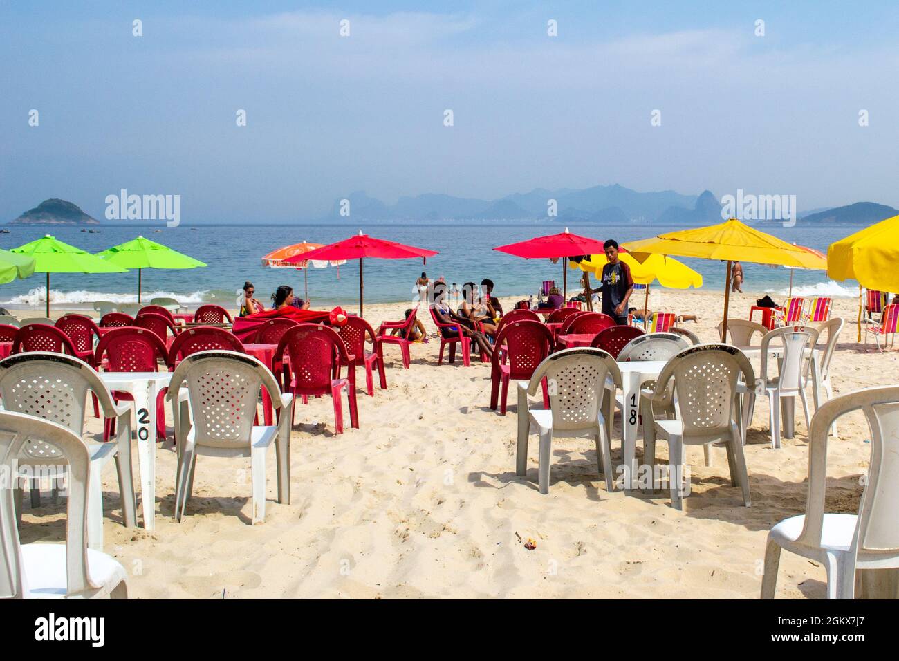Pattern of chairs and umbrellas of small business are seen in Itaipu ...