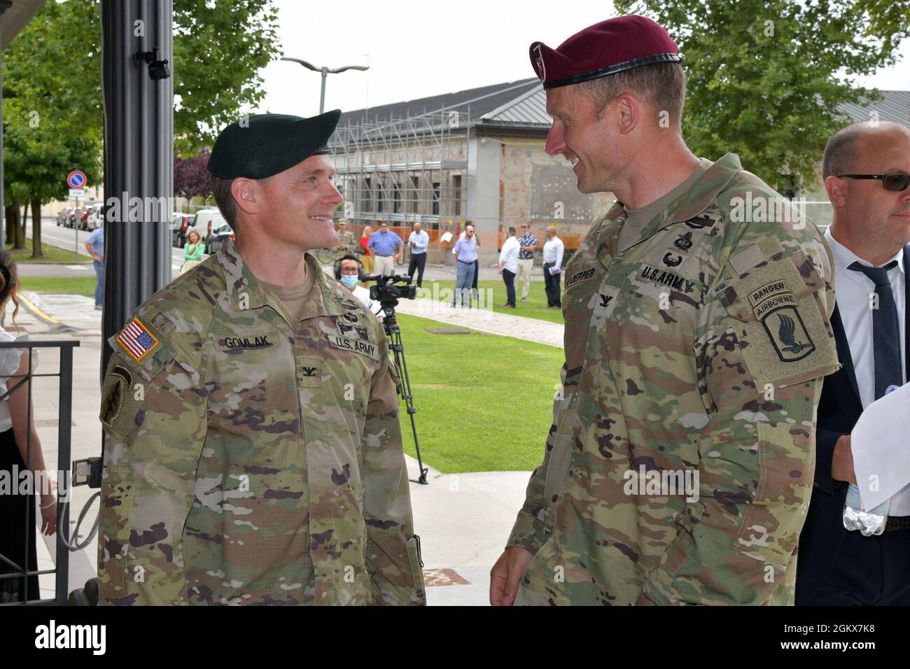 U.S. Army Col. Matthew J. Gomlak, incoming commander of U.S. Army Garrison Italy, right, speaks ...