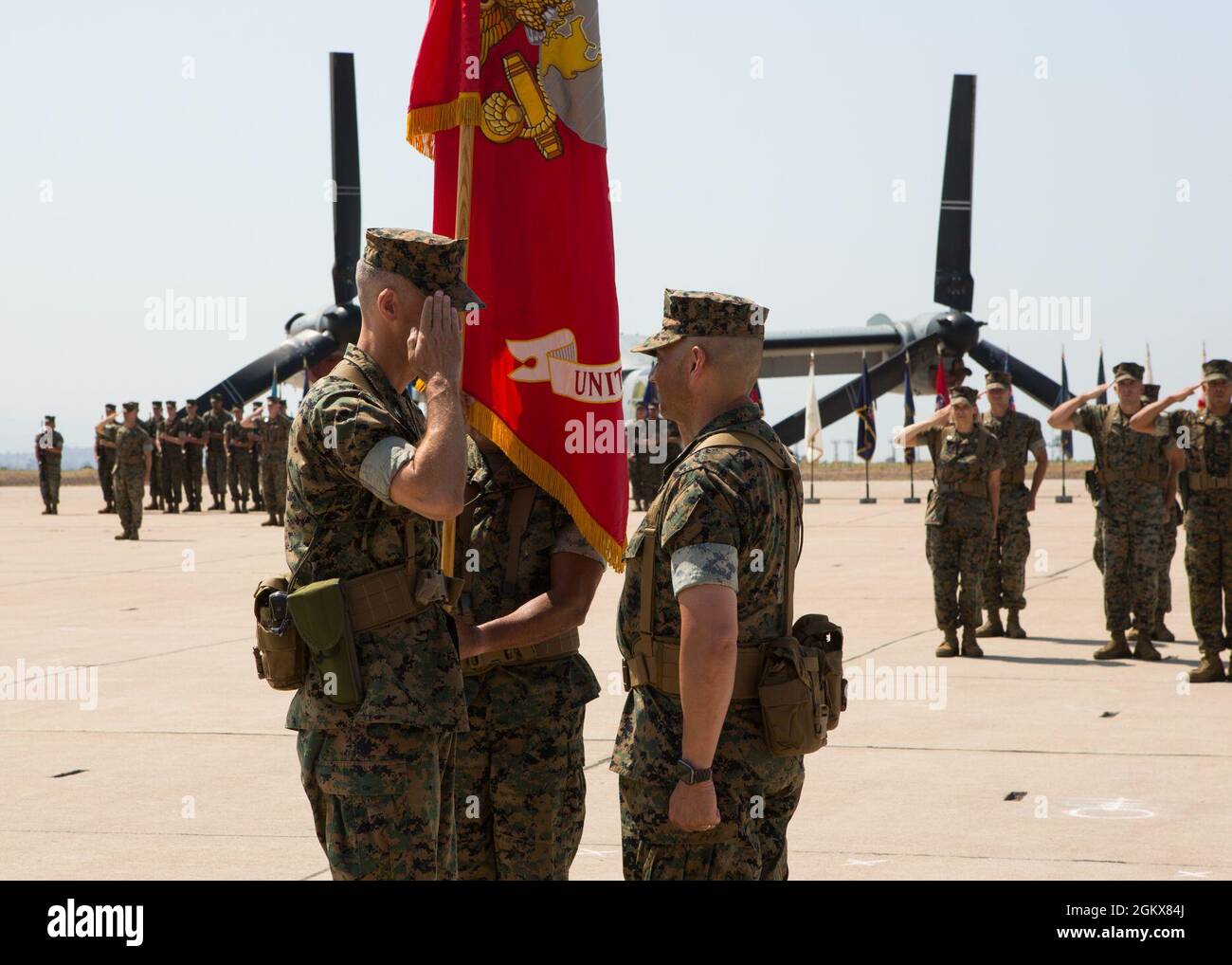 U.S. Marine Col. Eric Garcia, (right) the outgoing commanding officer ...