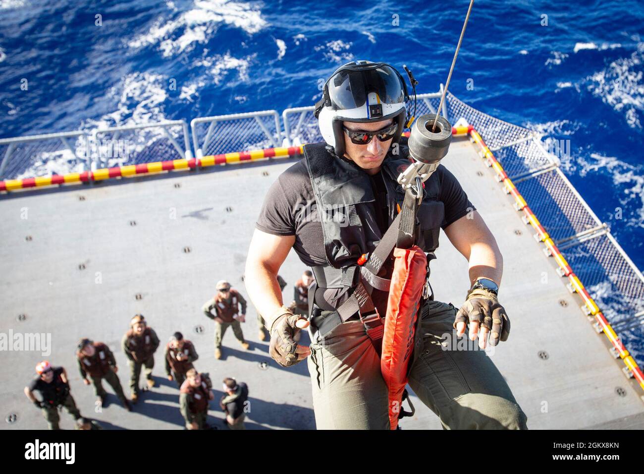 U.S. Navy Petty Officer 2nd Class Ty Nichols, a crew chief with ...