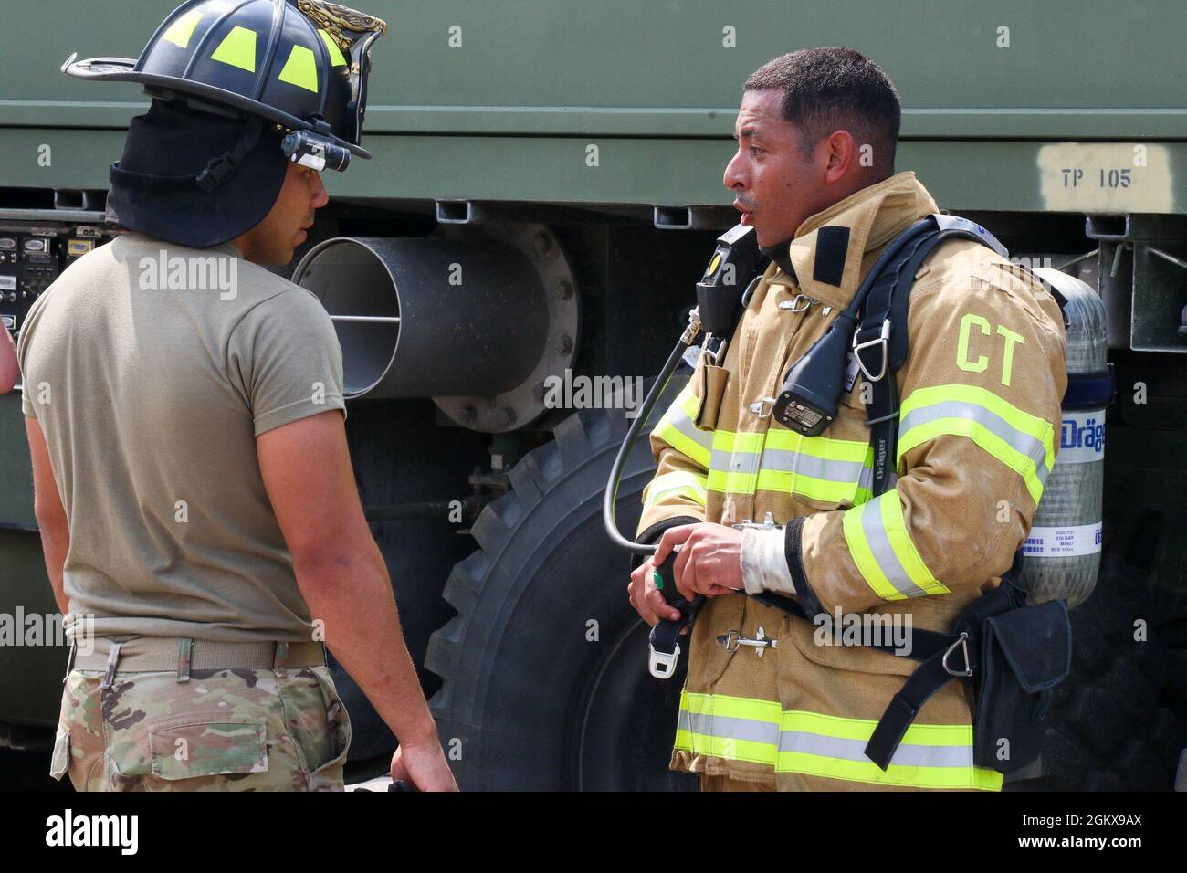 Army Reserve Spc. Frank Vargas, right, a firefighter with the 467th ...