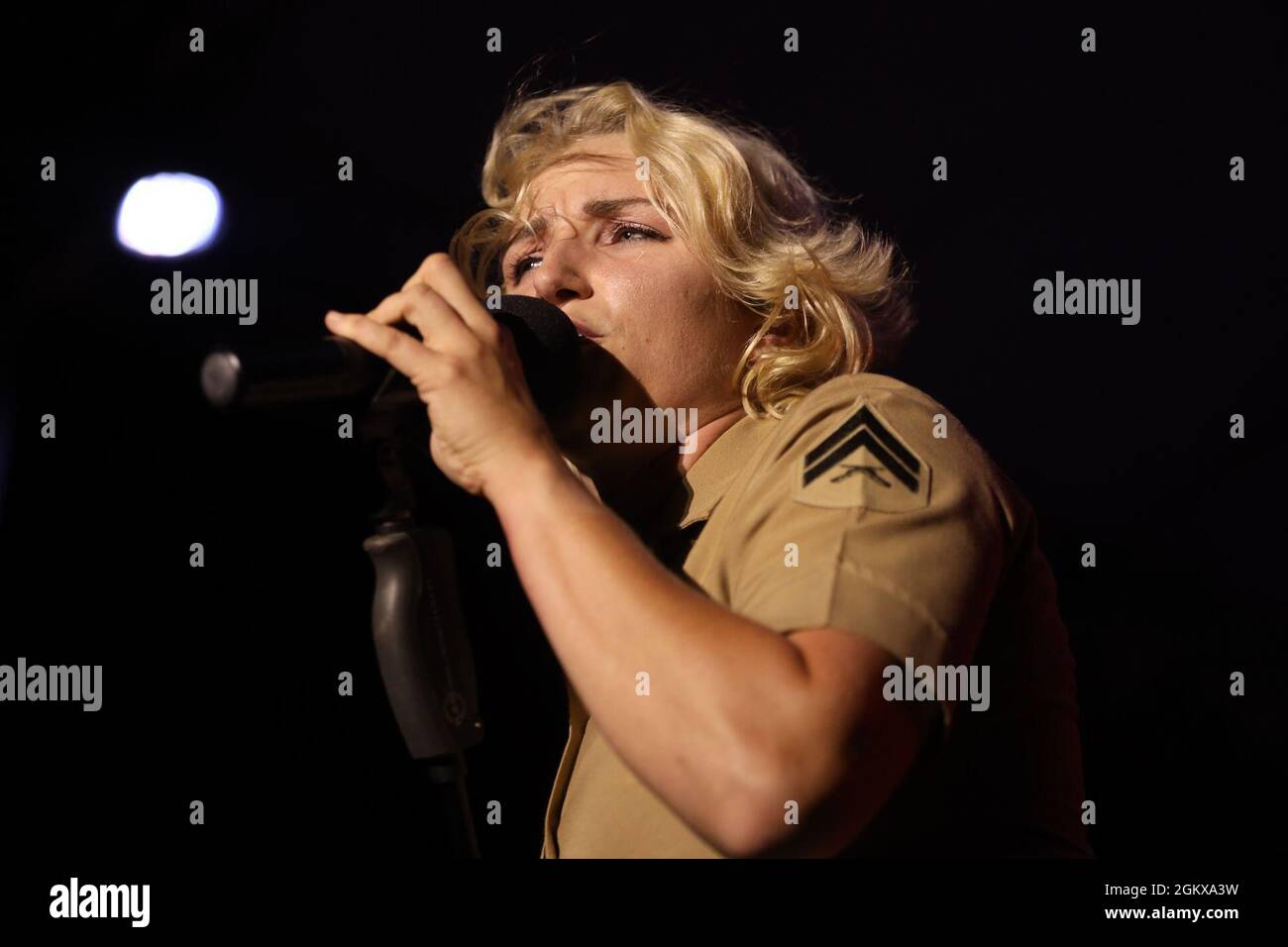 Cpl. Dana H. Reminsky with The Parris Island Marine Band sings at the ...
