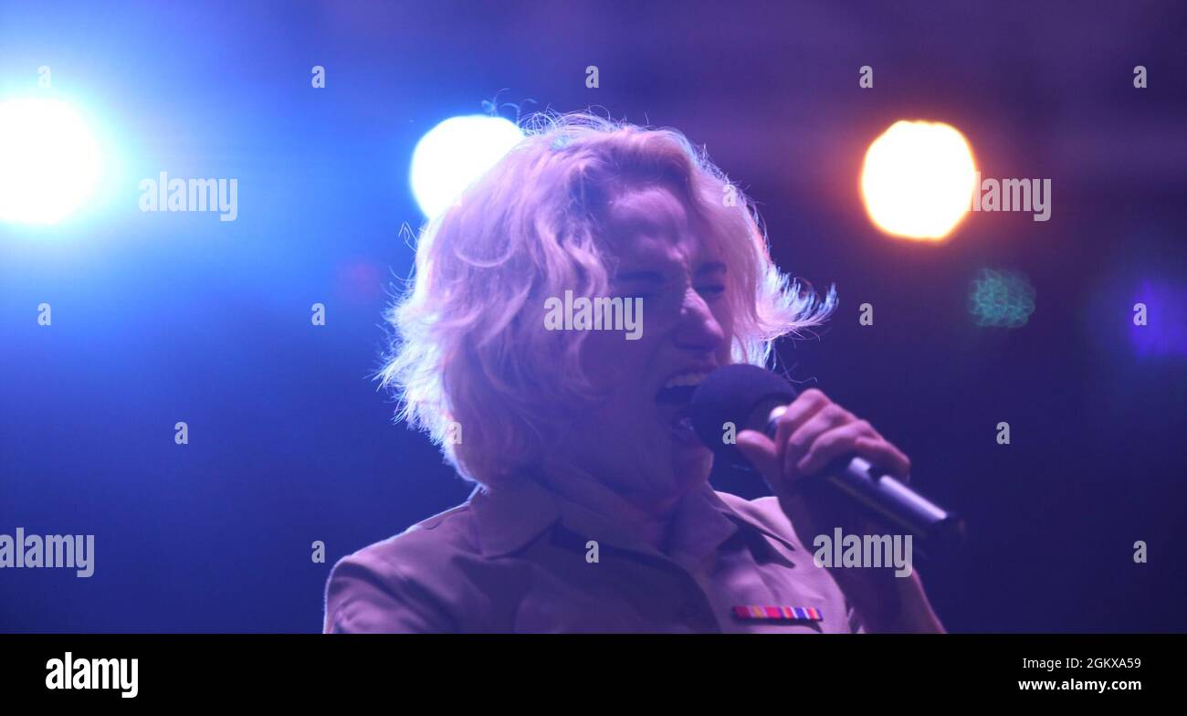 Cpl. Dana H. Reminsky with The Parris Island Marine Band sings at the ...