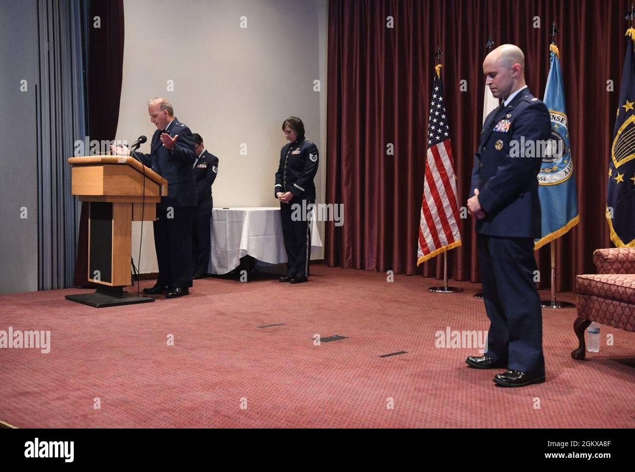 Lt. Col. Andrew McIntosh, 374th Airlift Wing chaplain, officiates the ...