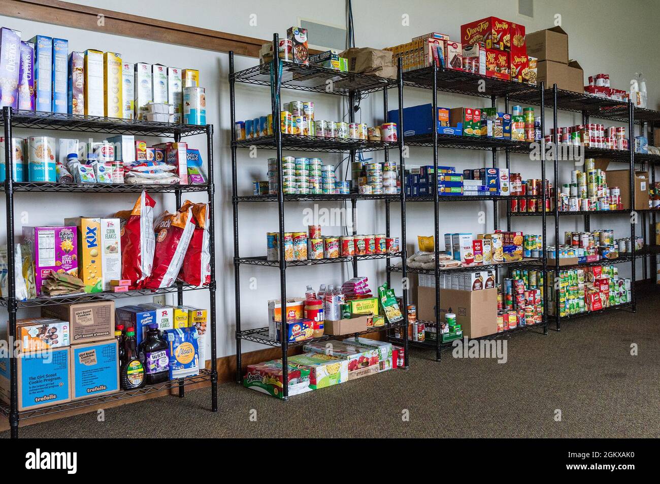 Food and non-perishable items sit on shelves in the Airman's Attic food ...