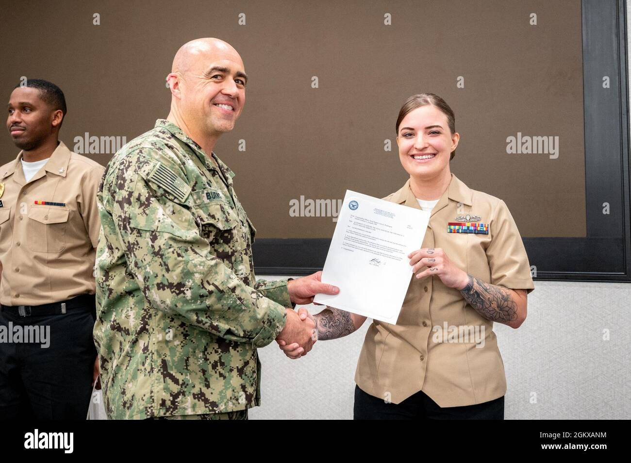 WASHINGTON, DC (July 16, 2021) – Capt. Mark Burns (center), Naval ...