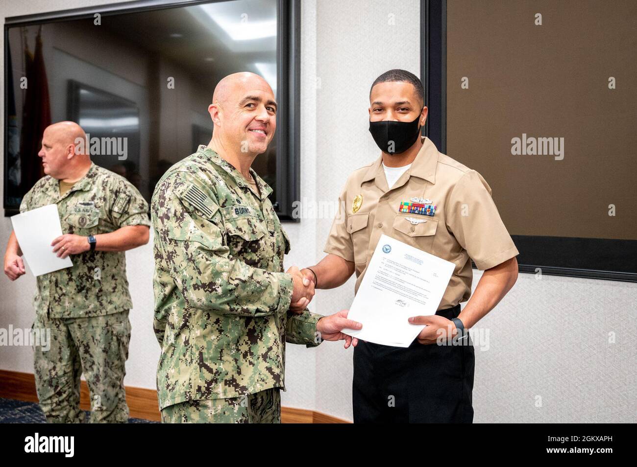 WASHINGTON, DC (July 16, 2021) – Capt. Mark Burns (center), Naval ...