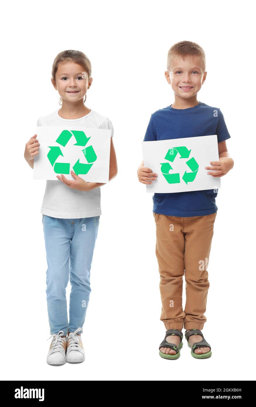Little children holding paper sheets with recycling symbol on white ...