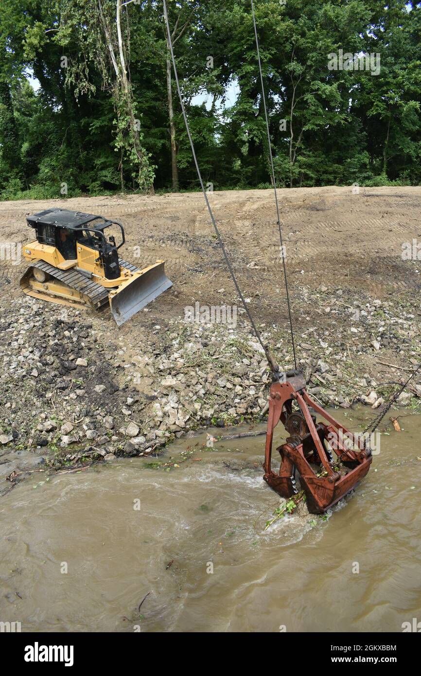 Heavy equipment operators from the U.S. Army Corps of Engineers ...