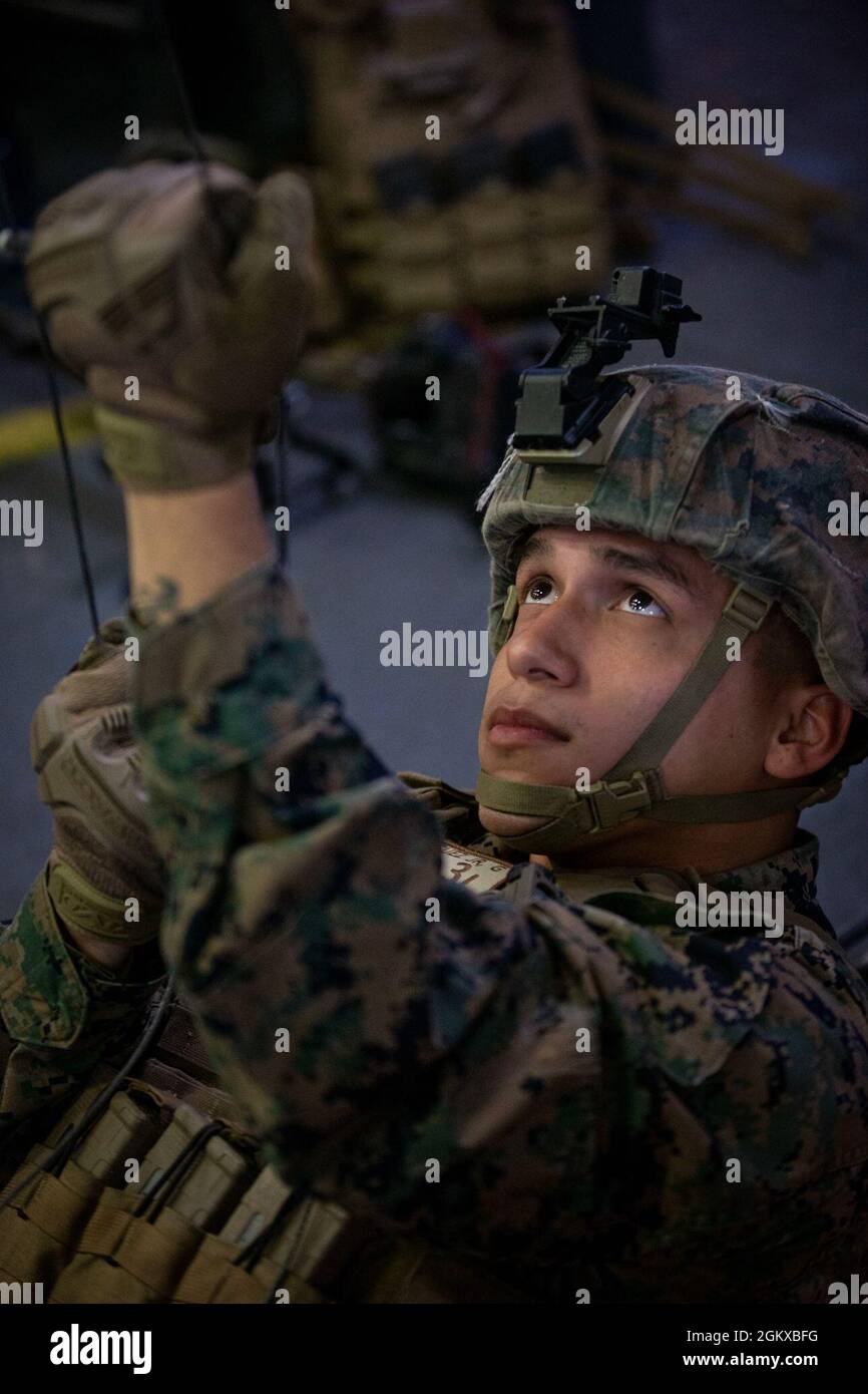 A U.S. Marine with the Security Platoon, Battalion Landing Team 3/5 ...