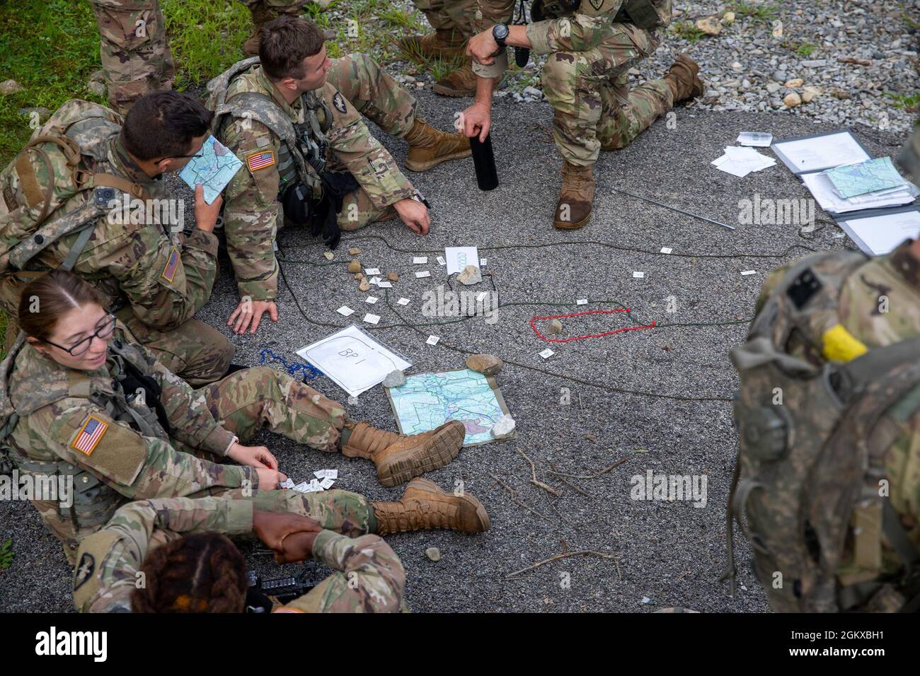 West Point Cadets conduct mission planning around a terrain model ...