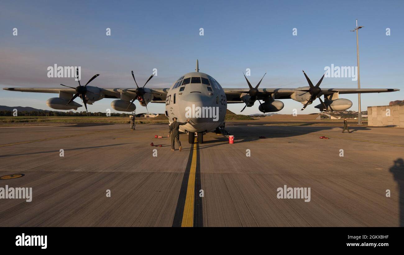 U.S. Marine Corps KC-130J Super Hercules aircraft with Marine Refueler ...