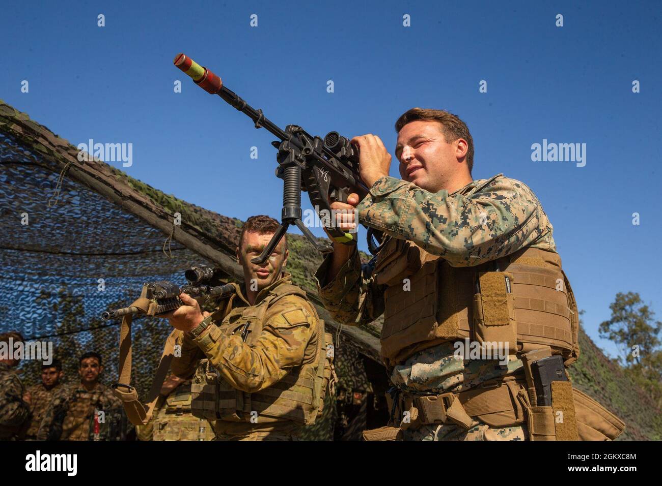 Australian Defence Force Gunner Brayden Lambert (left), an artillery ...