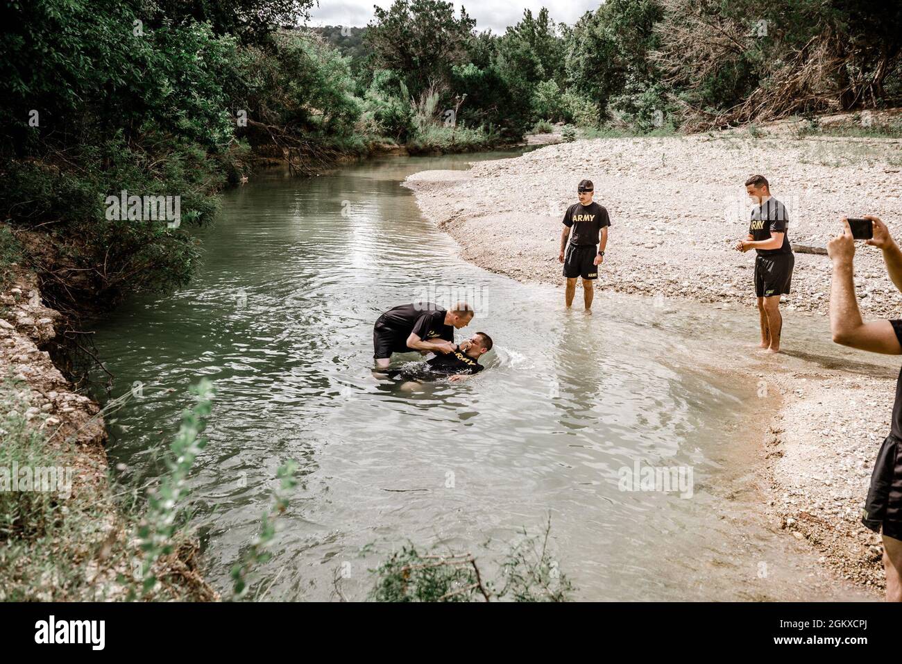 1st LT. Joel Nelson (Chaplain candidate) baptizes; Spc. Clark, Brandon ...