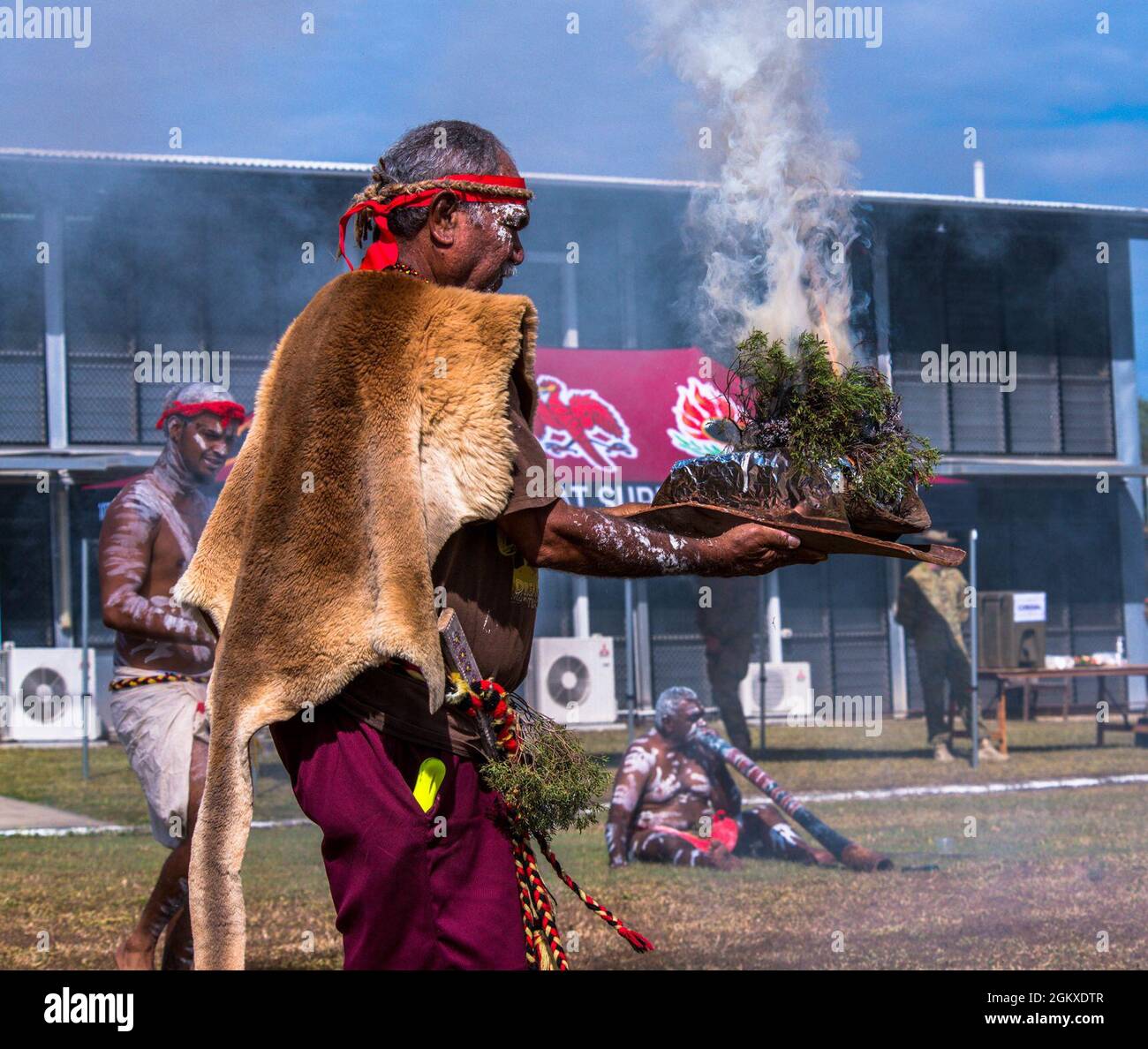 Bindal Elder, Uncle Alfred Smallwood performs the smoking ceremony ...