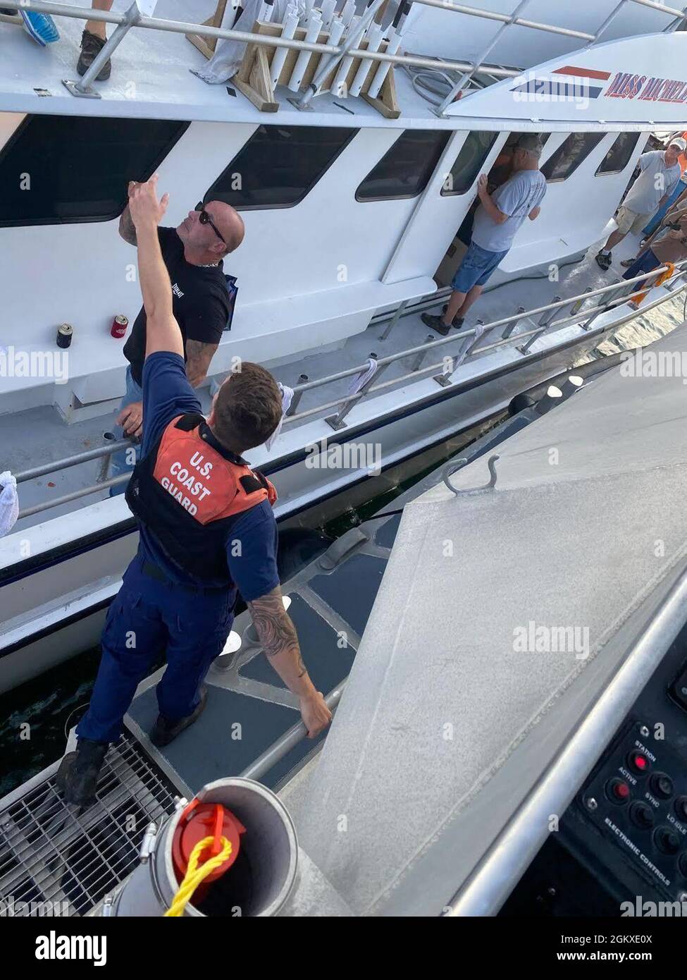 U.S. Coast Guard petty officer Christopher Benya, a crew member aboard ...