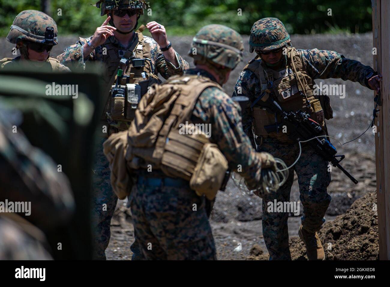 U.S. Marines with Marine Wing Support Squadron (MWSS) 171, place a ...