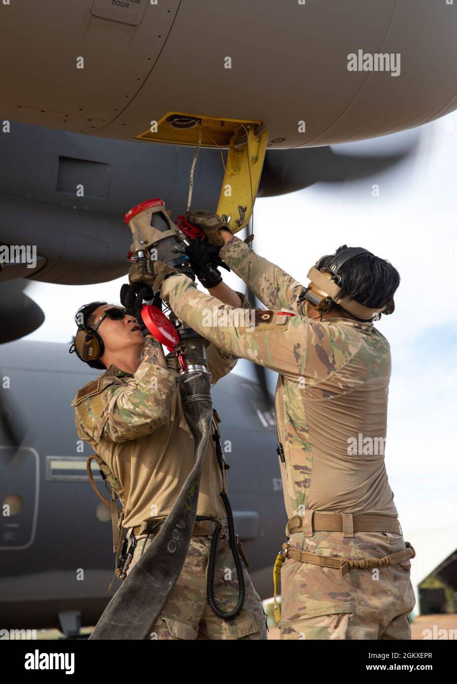 Loadmasters with the 1st Special Operations Squadron participate in a ...