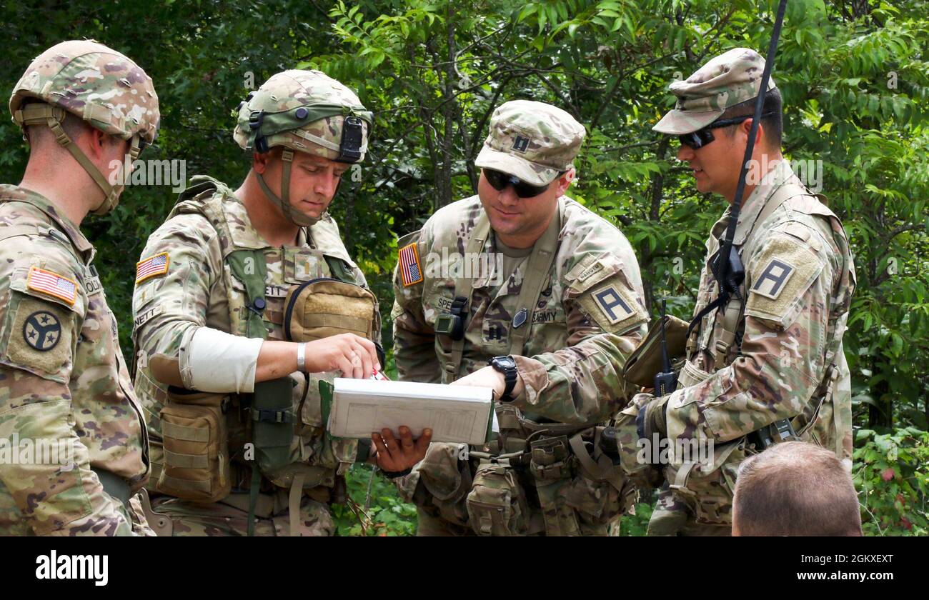 FORT HOOD, Texas -- Cpt. Robert Spencer and Sgt. 1st Class Jonathan ...