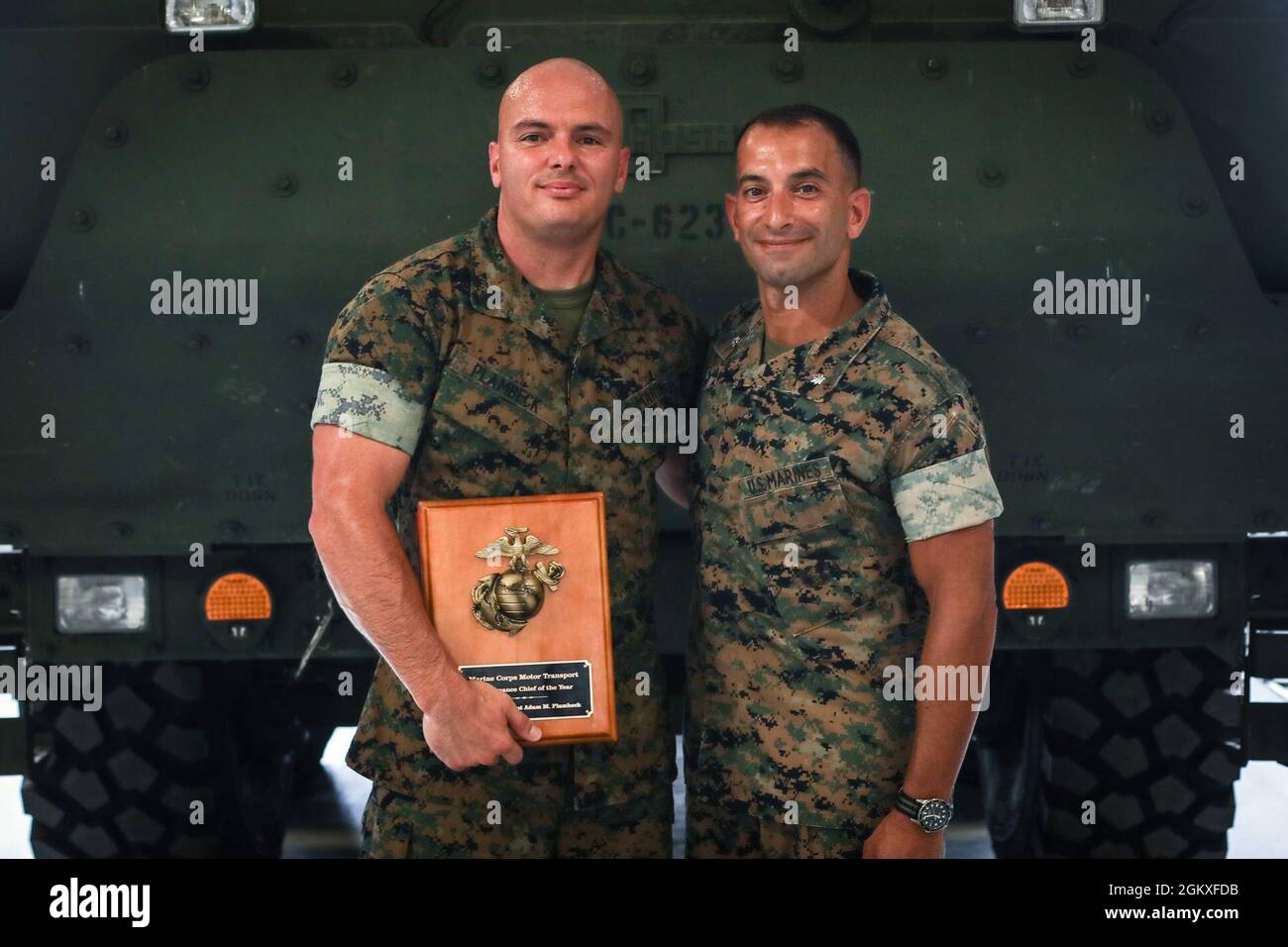 U.S. Marine Corps Gunnery Sgt. Adam M. Plambeck (left), Motor Transport ...