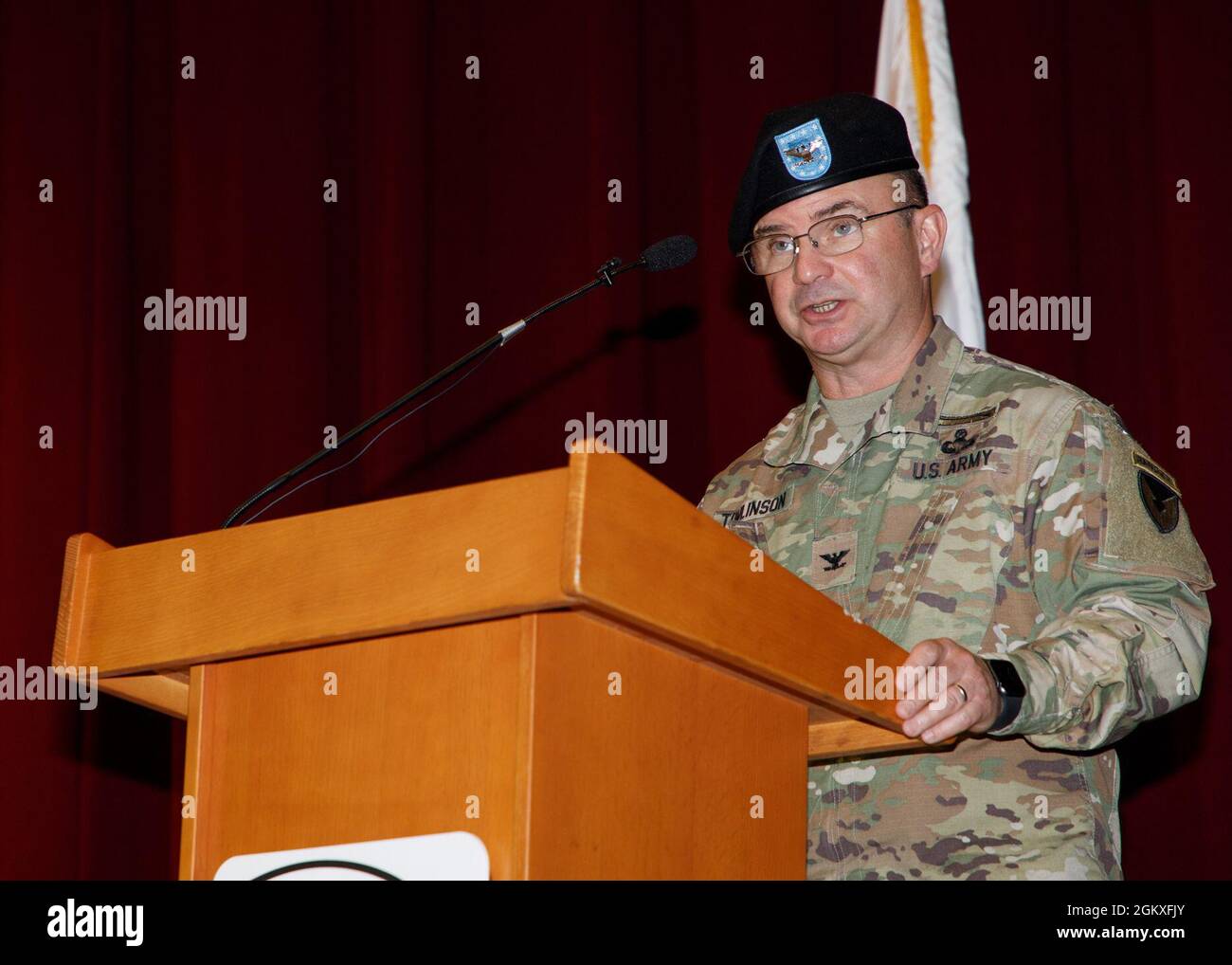 Col. Christopher L. Tomlinson gives remarks at a ceremony held July 20 ...
