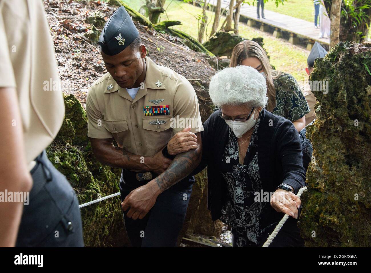 SANTA RITA, Guam (July 19, 2021) - A Sailor provides assistance to a ...