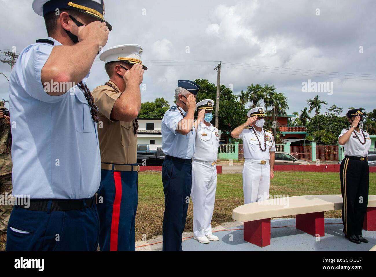 AGAT, Guam (July 19, 2021) - Military service members render salutes ...