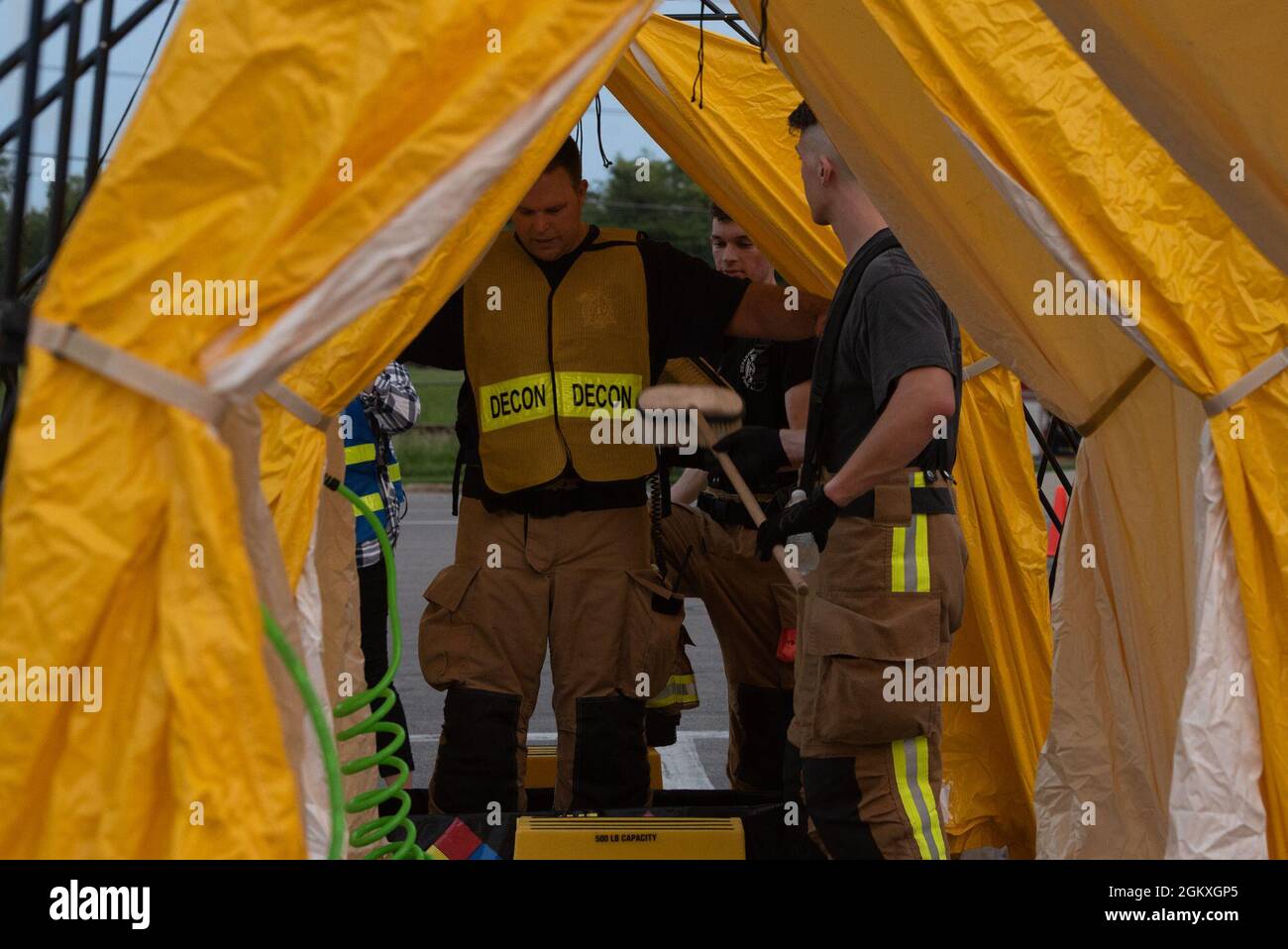Scott Forrest, 375th Civil Engineer Squadron firefighter, walks Airman ...