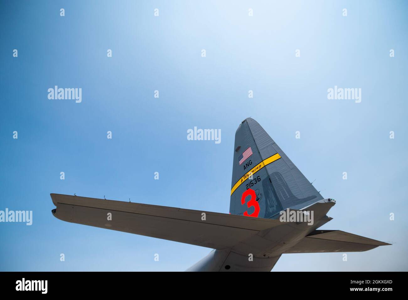 Members assigned to the 153d Airlift Wing prepare and load a C-130 ...