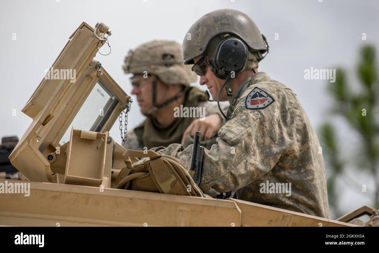 A U.S. Army Master Gunner Instructor and a Student, assigned to 3rd ...