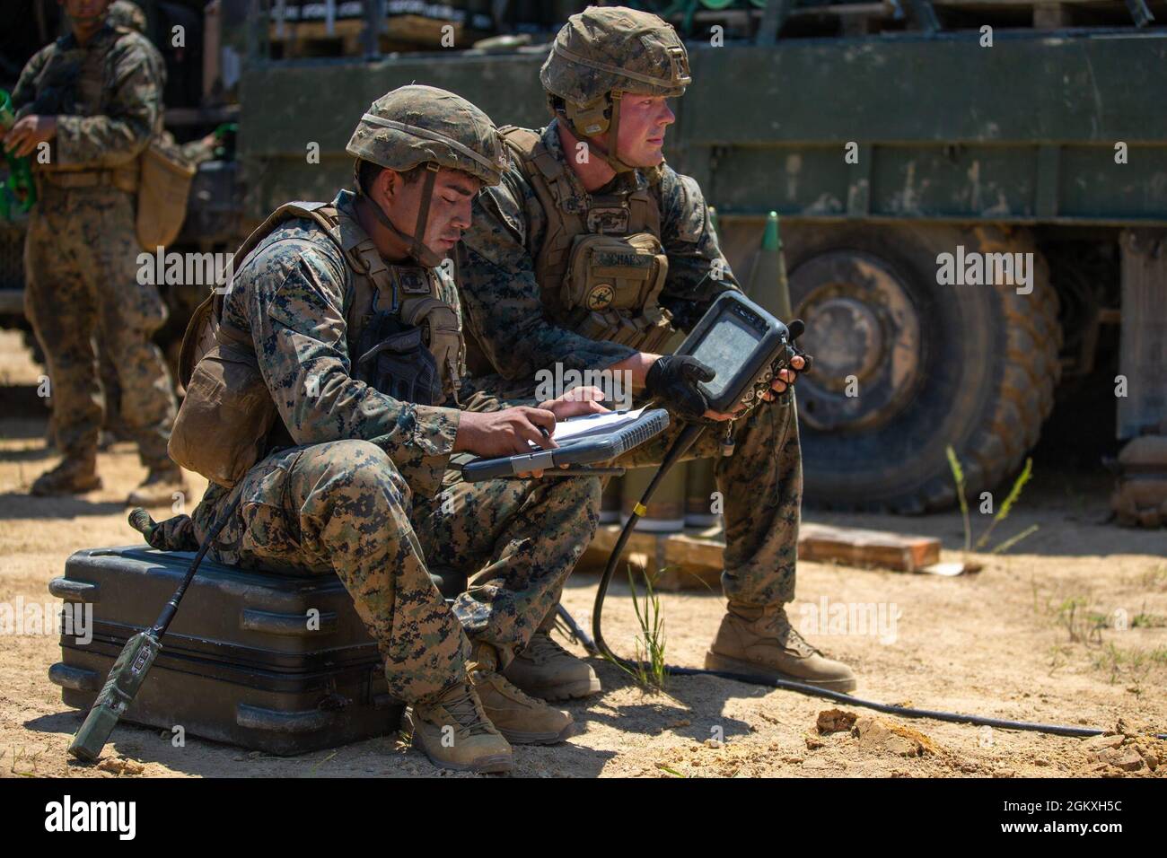 U.S. Marine Corps Cpl. Jonathan Farfan (left) and Cpl. Colton Ferrin ...