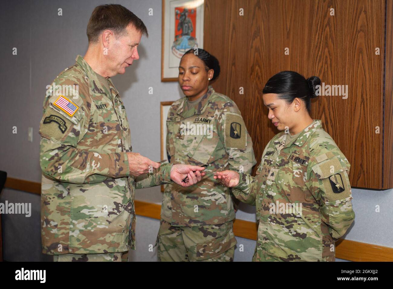 U.S. Army Sgt. Angelu Legaspi and Spc. Cierra Ellis, assigned to 55th ...