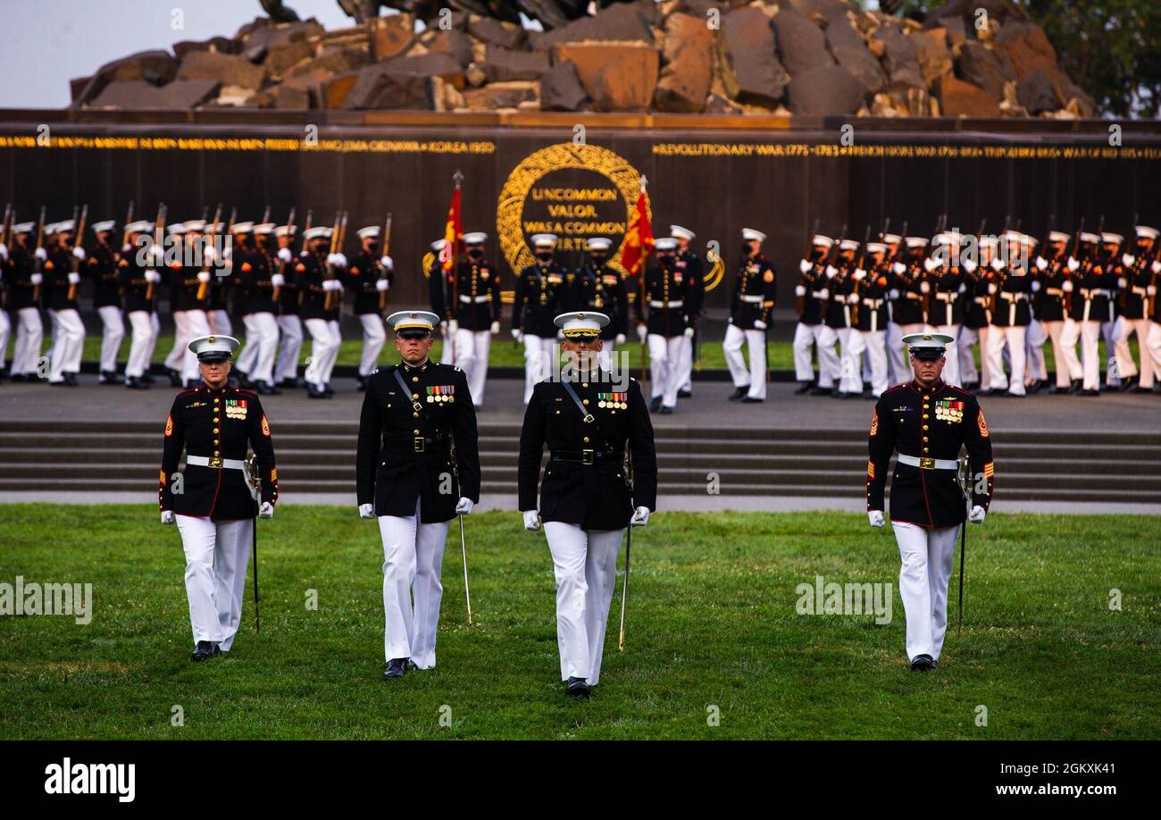 Barracks Marines march on to the parade deck during a Tuesday Sunset ...