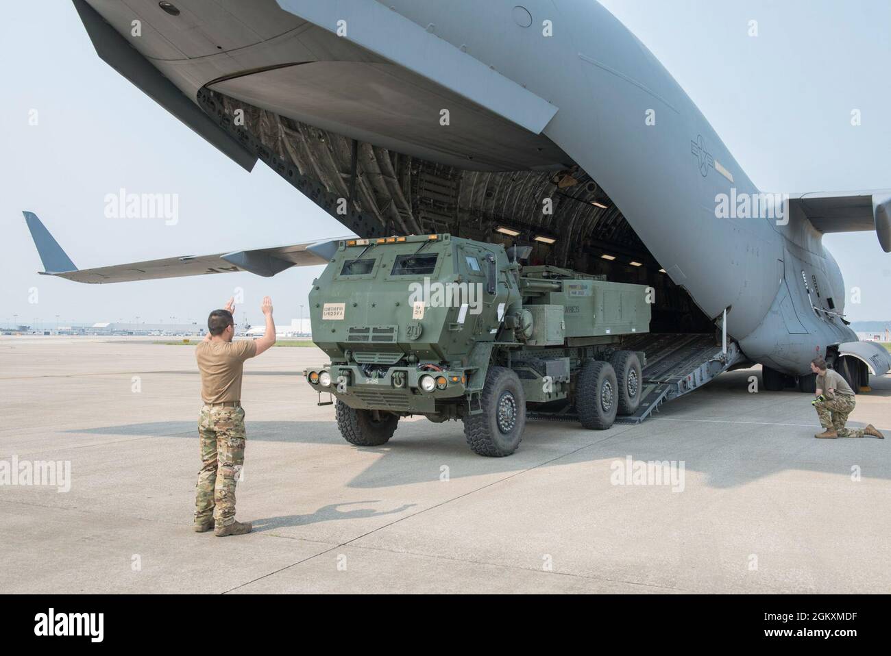 A loadmaster with the 167th Operations Group taxis a U.S. Army High ...