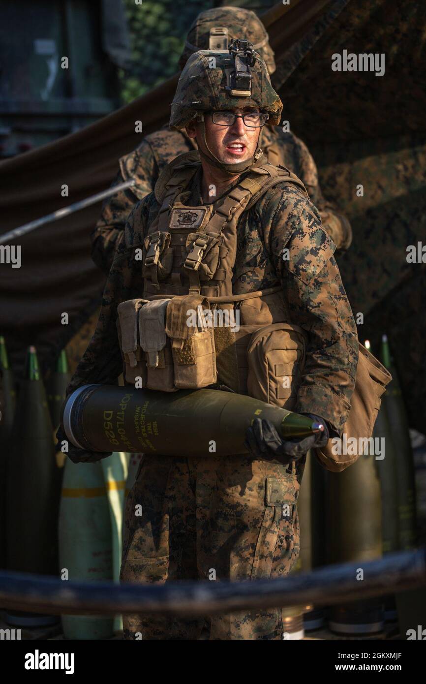 U.S. Marine Corps Cpl. Anthony Ziegler, a field artillery cannoneer ...