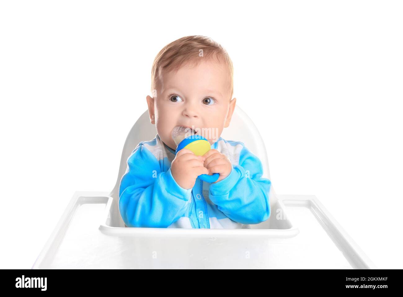 Cute little baby with nibbler on white background Stock Photo - Alamy