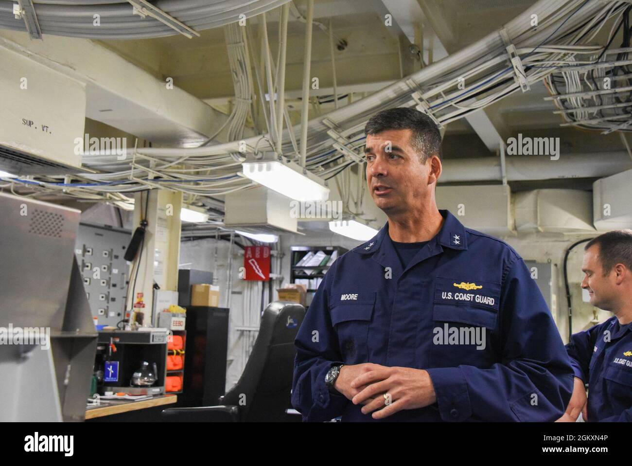 Coast Guard’s 17th District Rear Adm. Nathan Moore speaks to crew members of Coast Guard Cutter ...