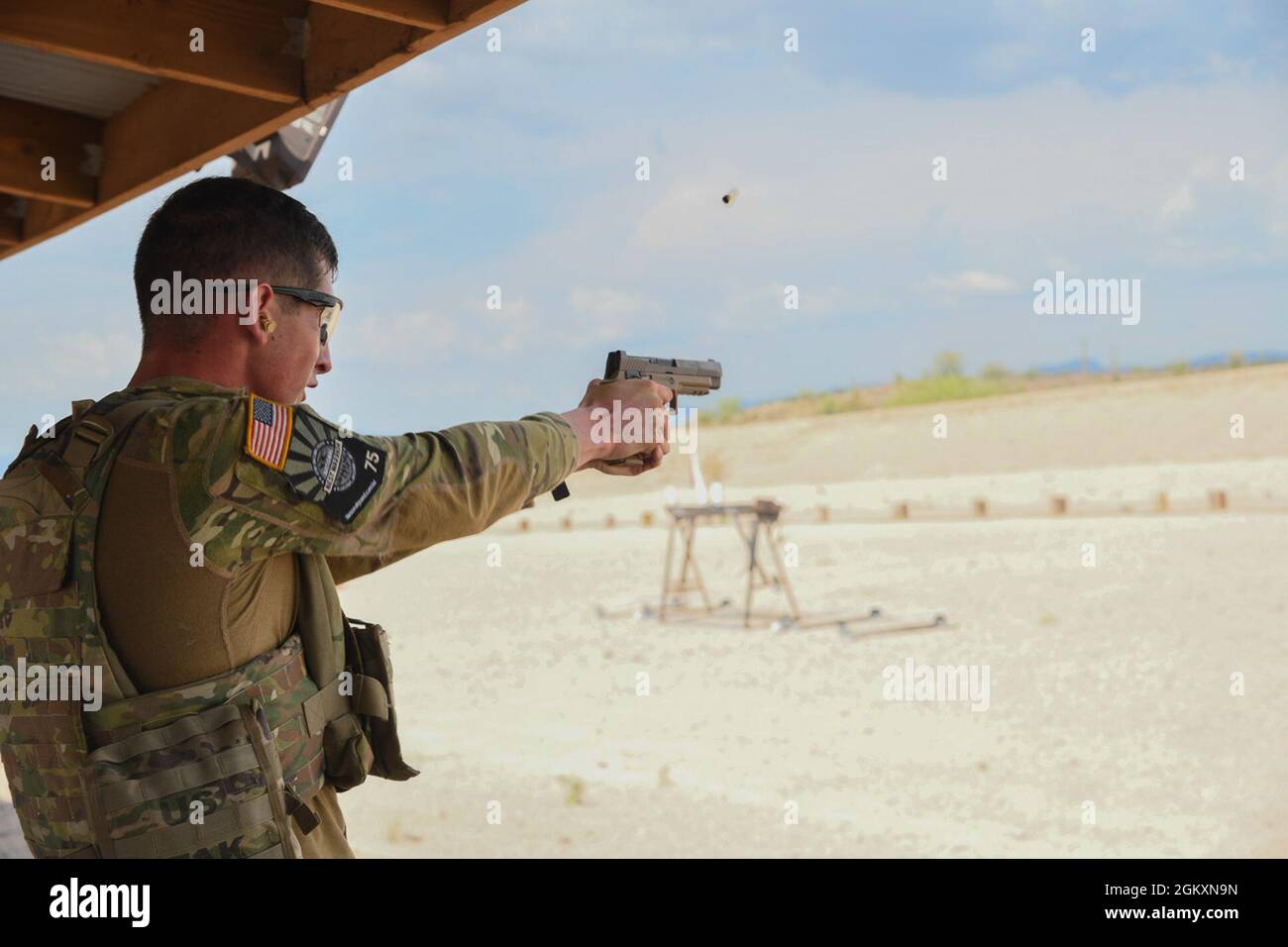 Spc. Adam Barlow, from the 65th Field Artillery Brigade, Utah National ...