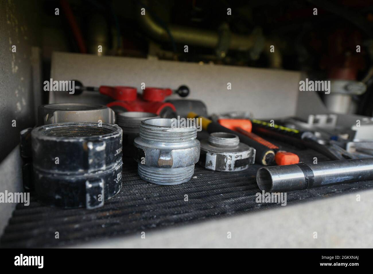 Tools sit inside a tool box compartment of a P-19R Striker fire truck ...