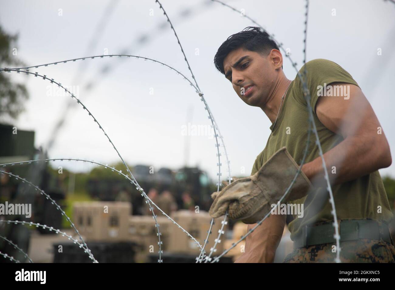 U.S. Marine Corps Lance Cpl. Muhammad Farooqui, a tactical air defense ...