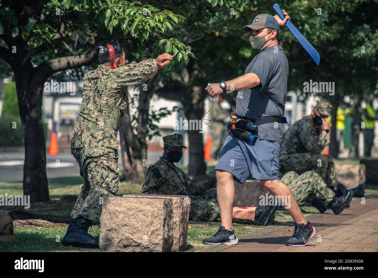 Master-at-Arms 1st Class Henry Zavala simulates an attack on Logistics ...